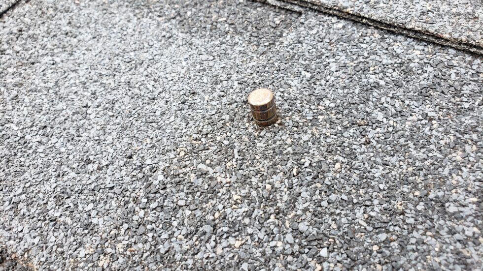 Bullet In New Roof | Professional Engineering Inspections, Inc.