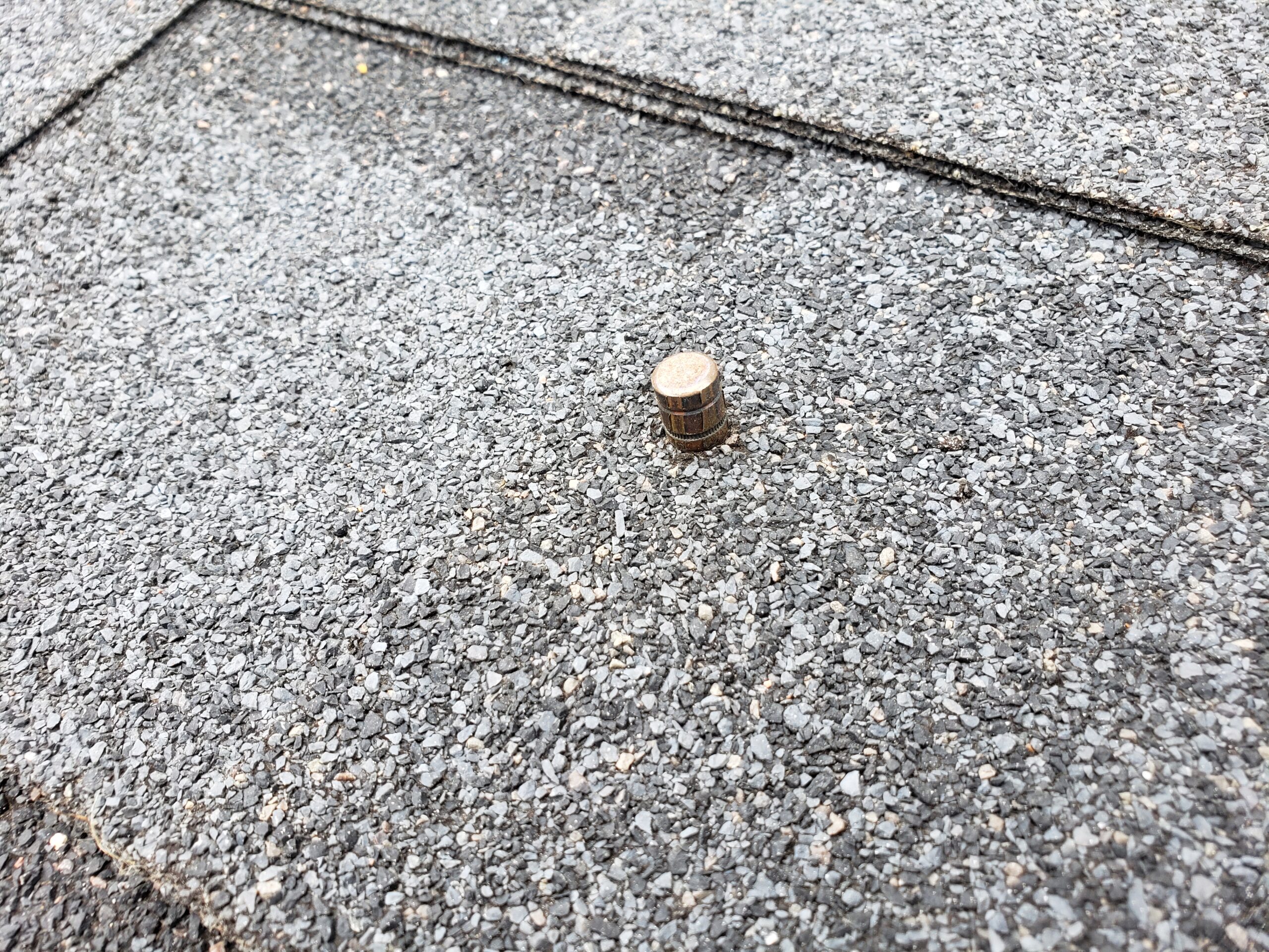Bullet In New Roof | Professional Engineering Inspections, Inc.
